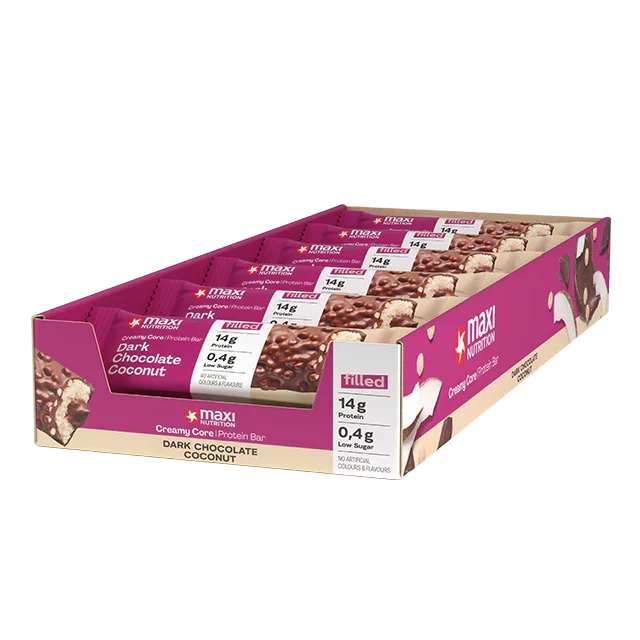Maxinutrition Creamy Core Protein Bars are stacked full of gooey creamy ...