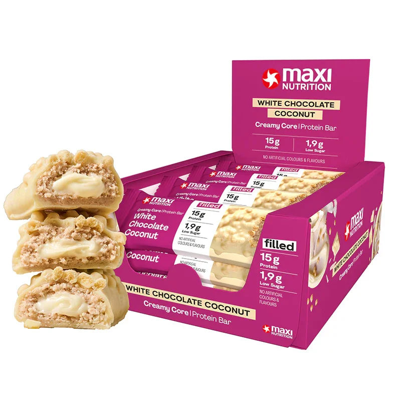 Maxinutrition Creamy Core Protein Bars are stacked full of gooey creamy ...